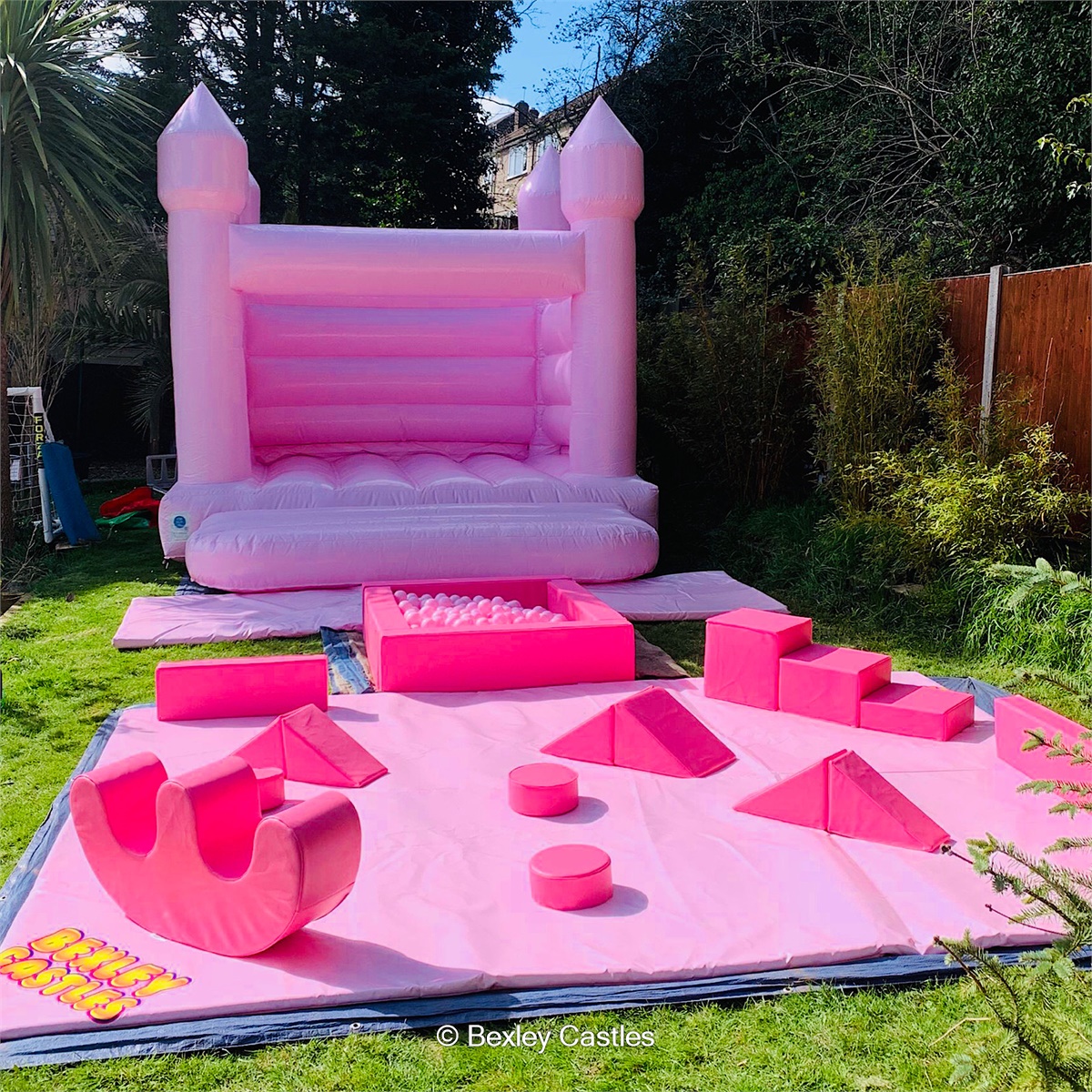 Pastel pink bouncy castle & soft play hire Bexley
